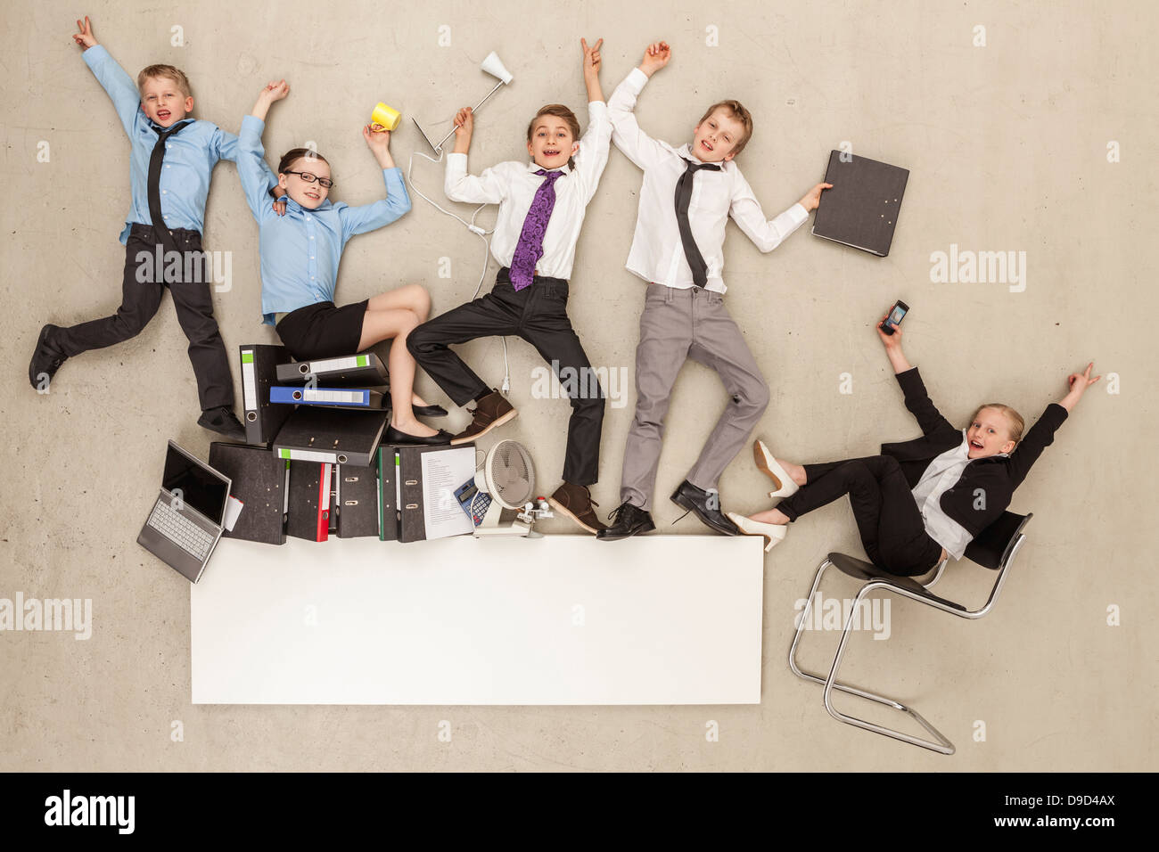Business kids in office Stock Photo - Alamy