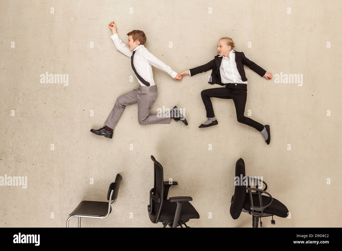 Business kids running in office Stock Photo - Alamy