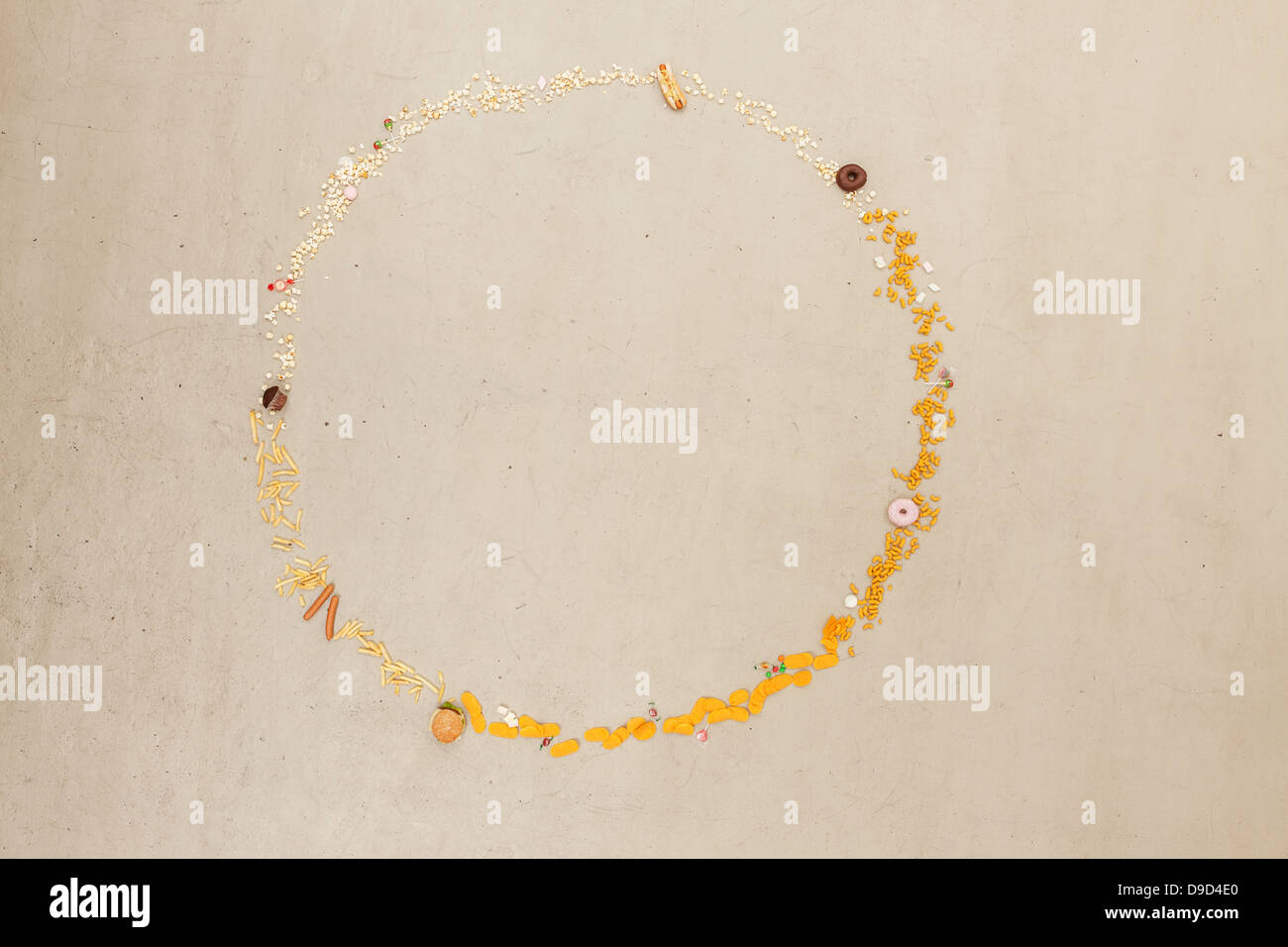 Variety of food on beige background Stock Photo - Alamy