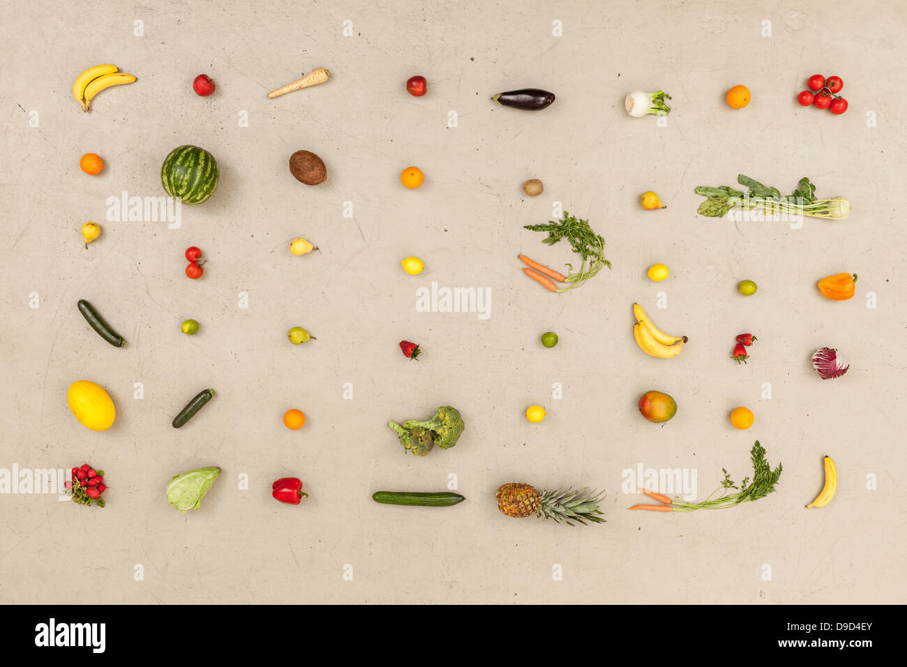 Variety of vegetables and fruits on beige background Stock Photo - Alamy
