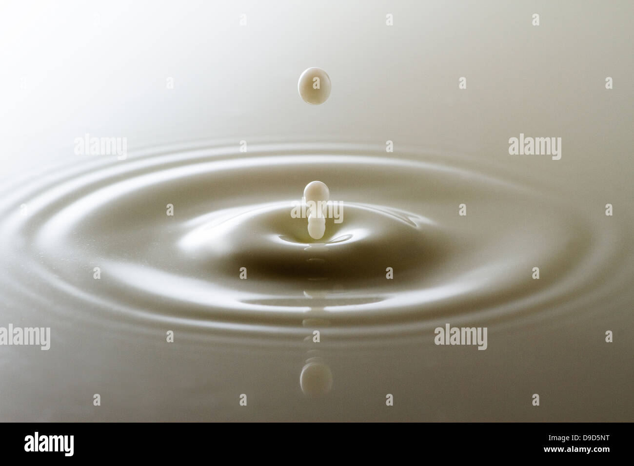 Ripples in milk Stock Photo - Alamy