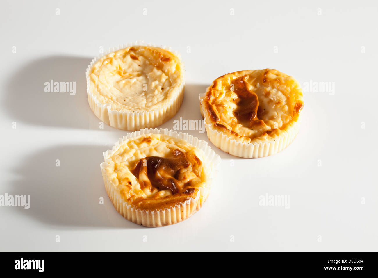 Cheese tartlets on white background, close up Stock Photo - Alamy