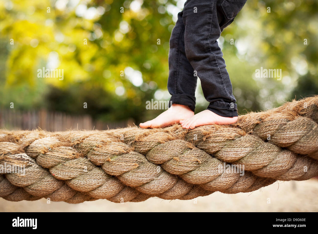Children crossing rope bridge hi-res stock photography and images - Alamy