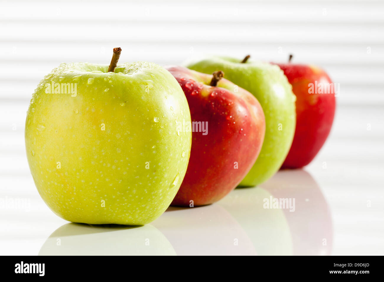 Red and green apples, close up Stock Photo - Alamy