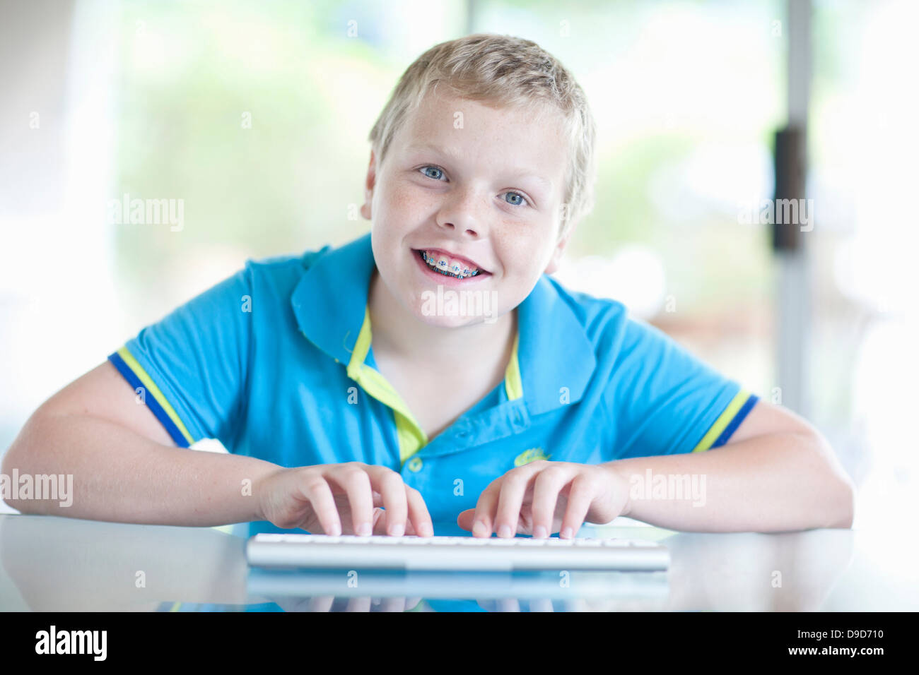 Boy using digital tablet Stock Photo - Alamy