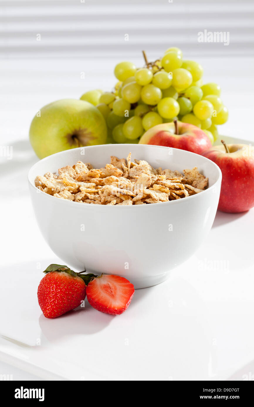 Bowl of cornflakes with various fruits, close up Stock Photo - Alamy