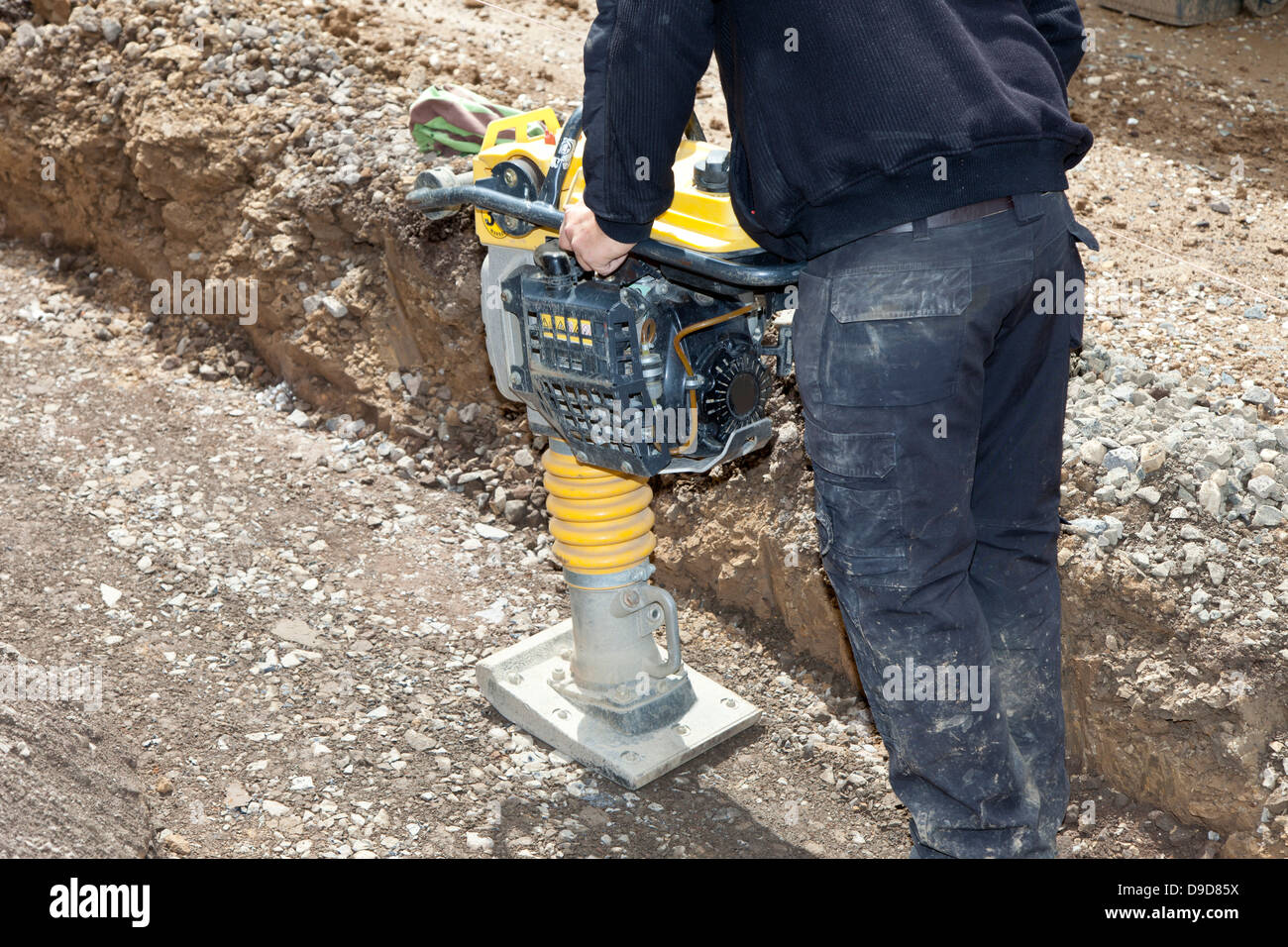 Man compactor hi-res stock photography and images - Alamy