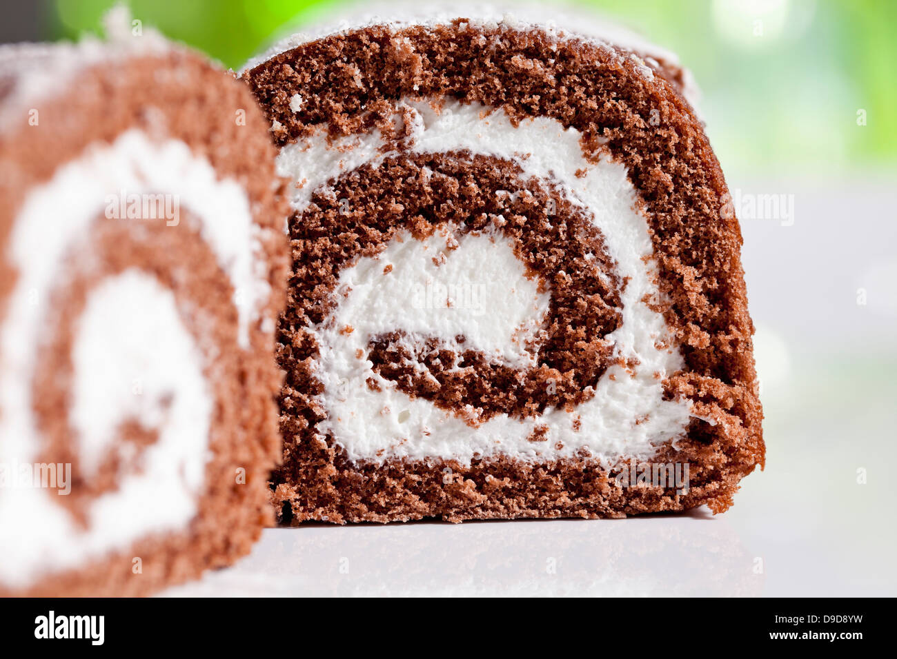 Chocolate roll sponge cake, close up Stock Photo - Alamy