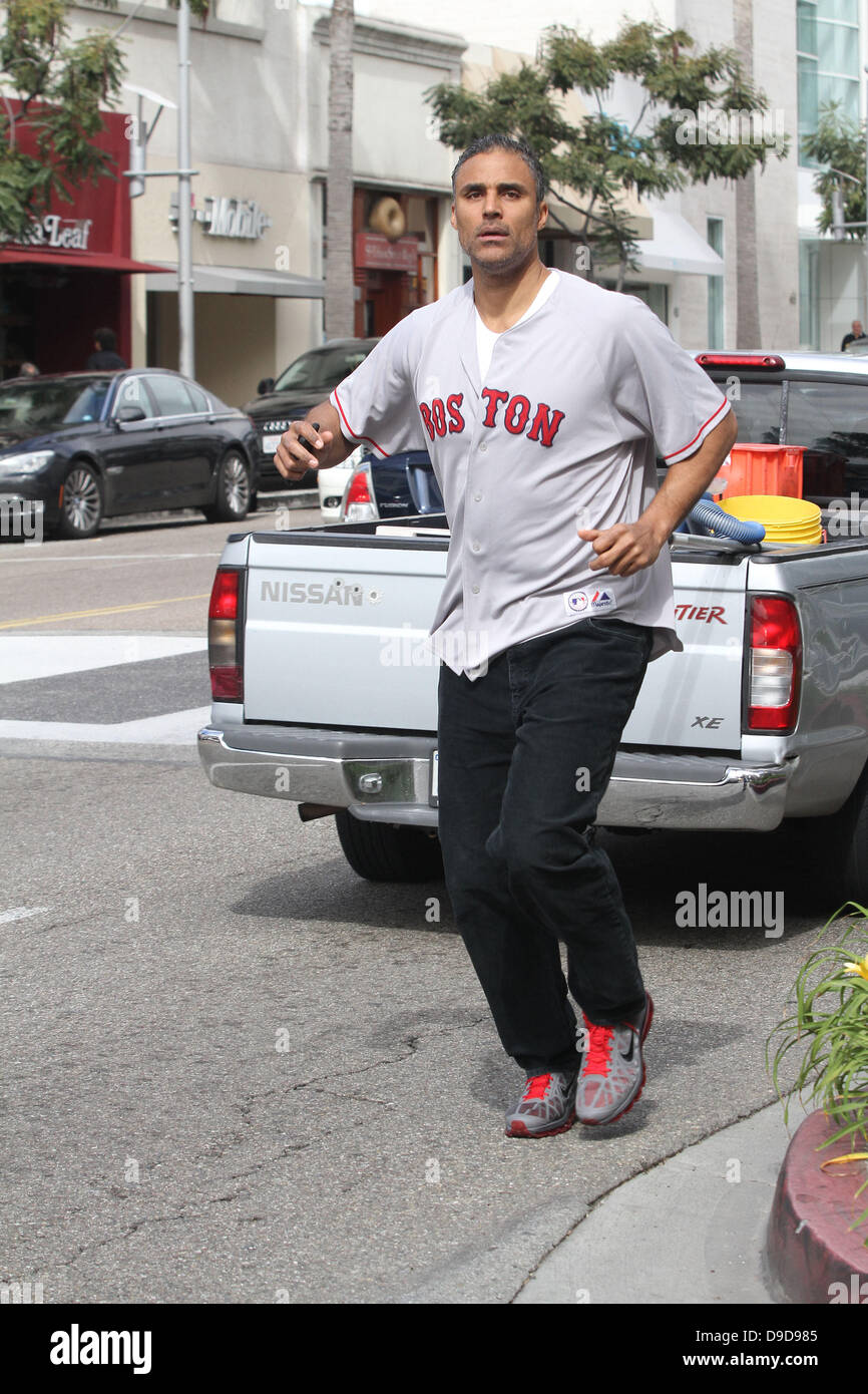 Rick Fox running to his car in Beverly Hills Los Angeles, California ...