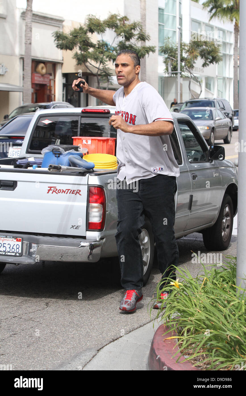 Rick Fox running to his car in Beverly Hills Los Angeles, California ...