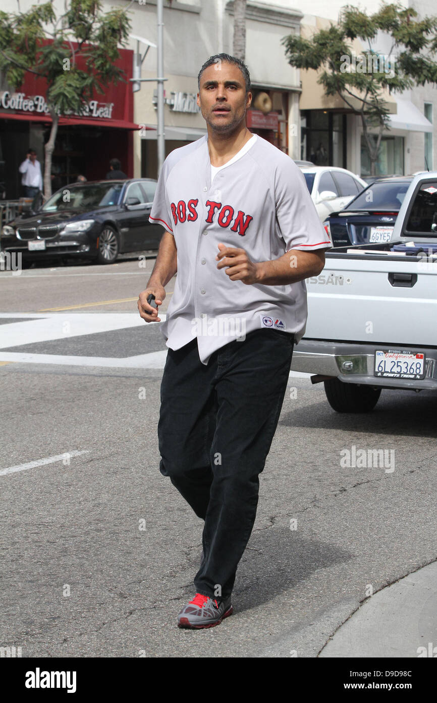 Rick Fox running to his car in Beverly Hills Los Angeles, California ...