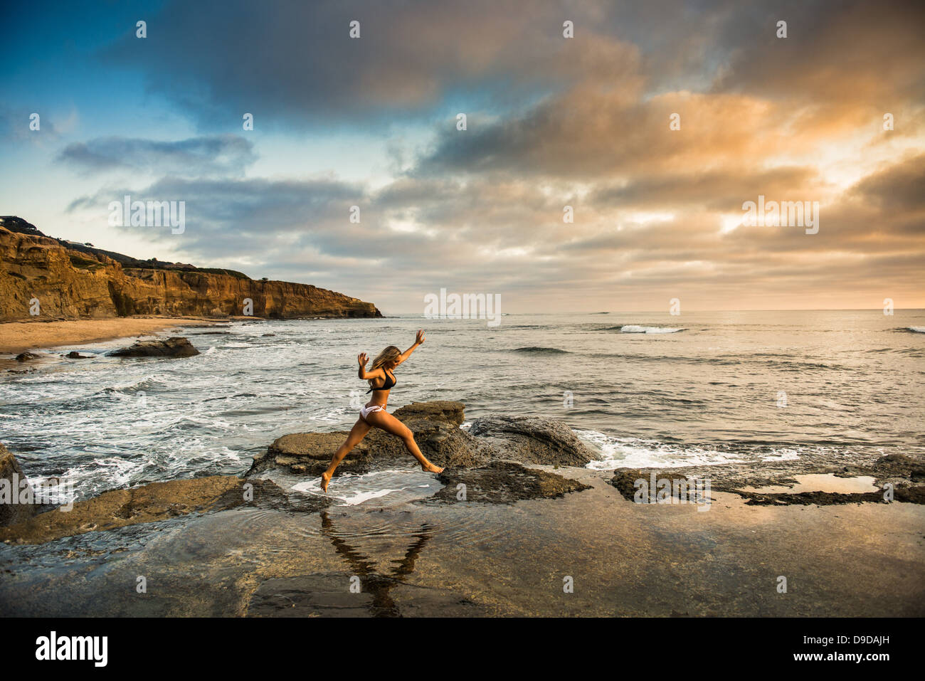 Leaping over rocks hi-res stock photography and images - Alamy