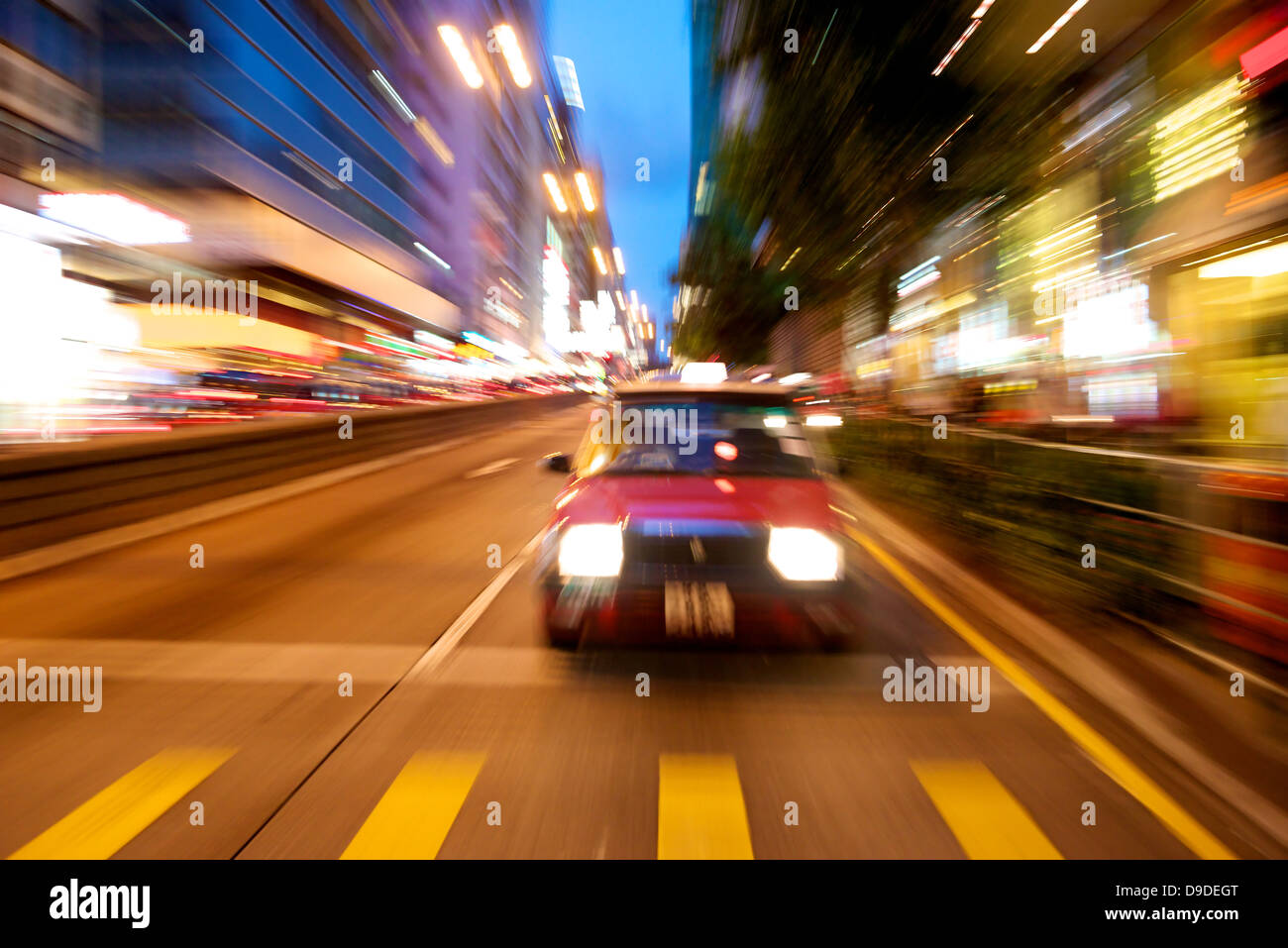 Hong Kong traffic at night in motion Stock Photo - Alamy