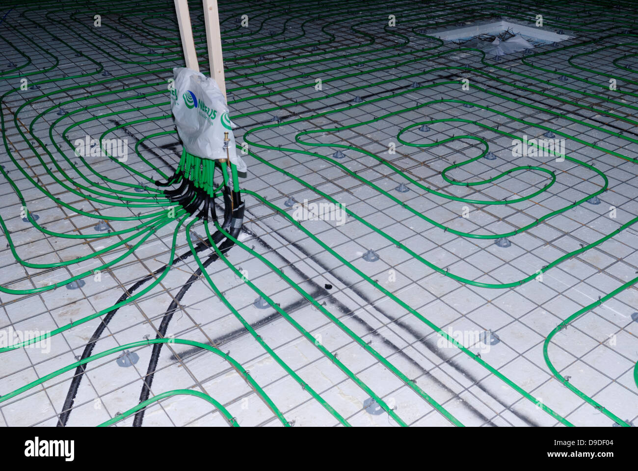 Underfloor hydronic heating pipes, before they are covered by concrete ...