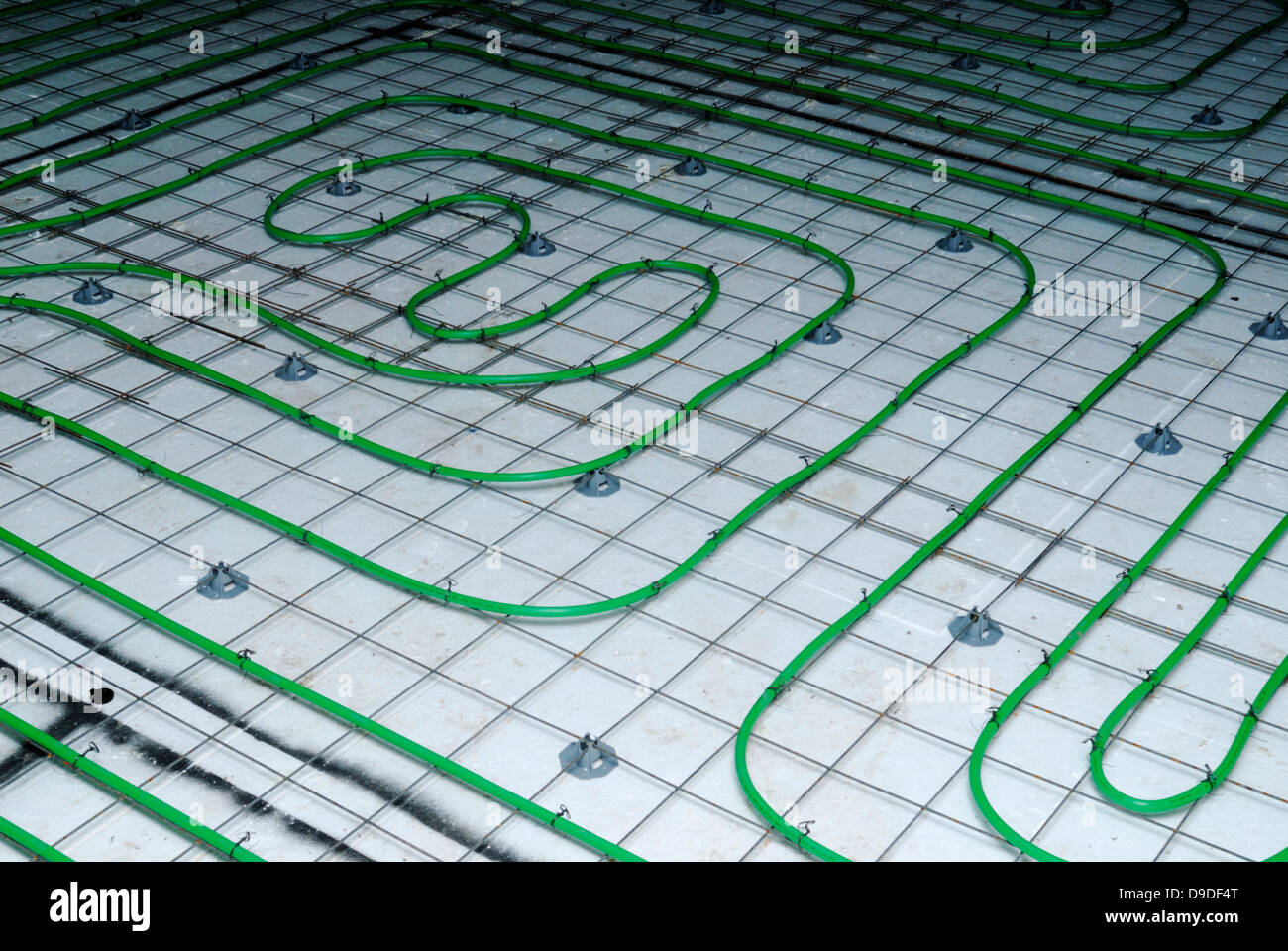 Underfloor hydronic heating pipes, before they are covered by concrete ...