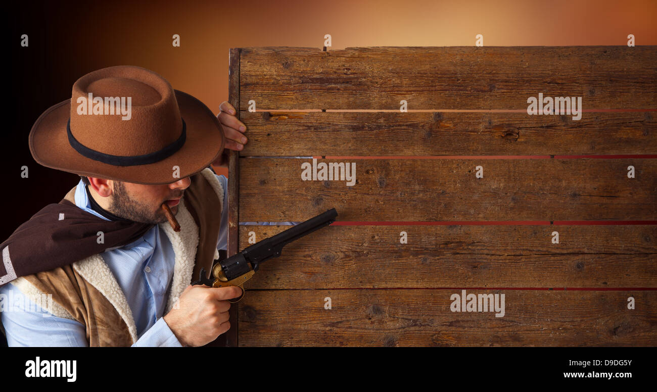 Cowboy gunslinger pointing gun hi-res stock photography and images - Alamy
