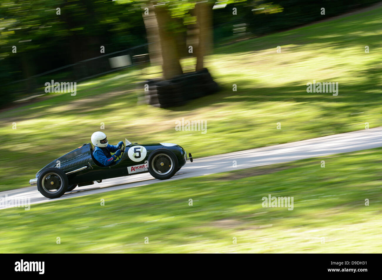 A car racing around Crystal Palace Park in London for the Motorsport at ...