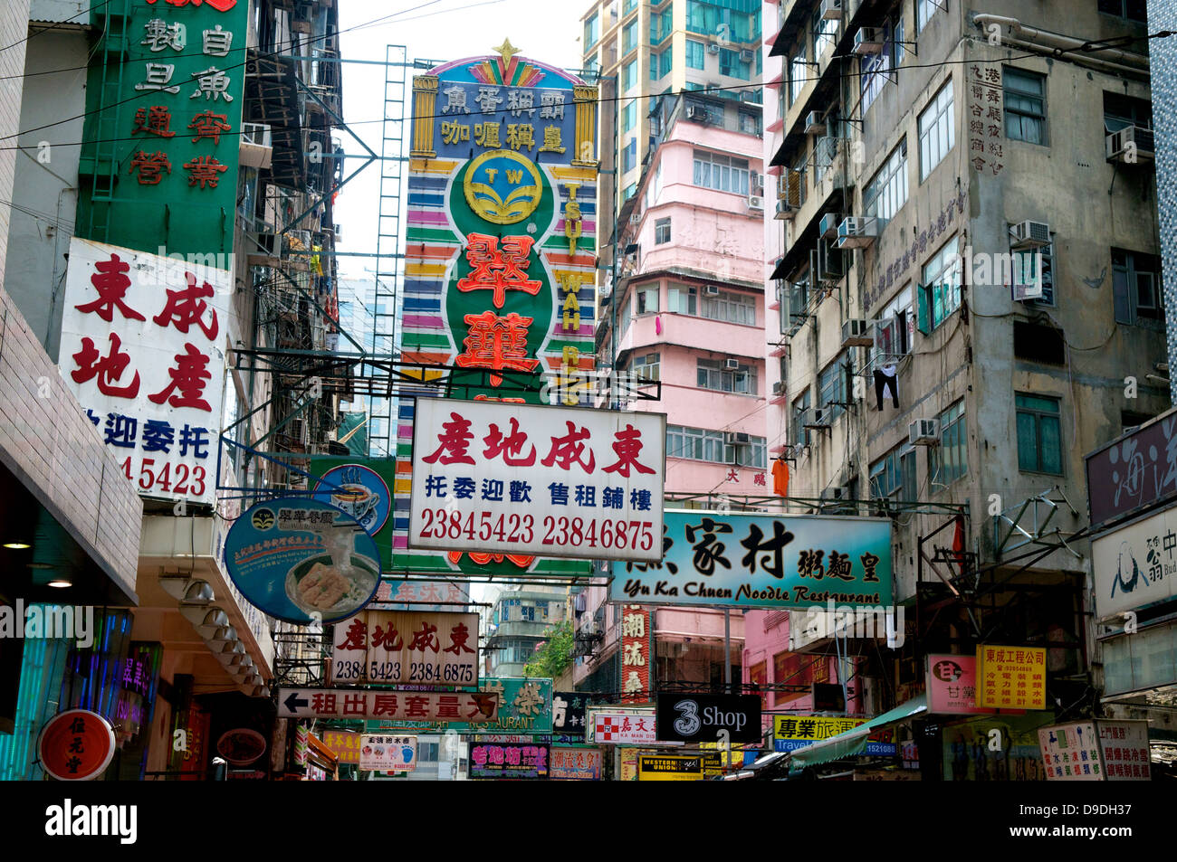 Busy street in Hong kong with signs Stock Photo - Alamy