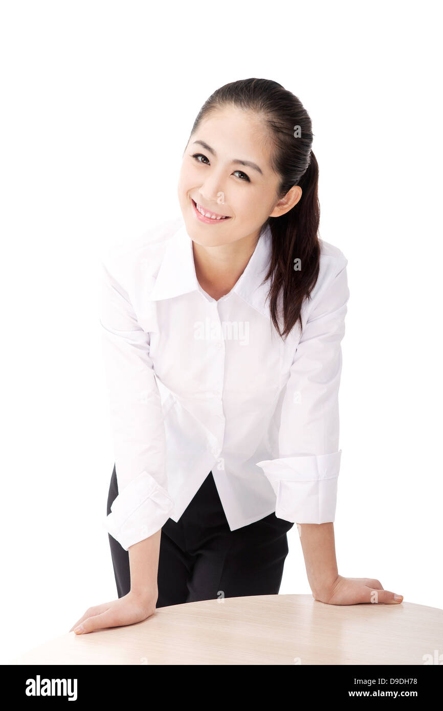 Woman bending over table hi-res stock photography and images - Alamy