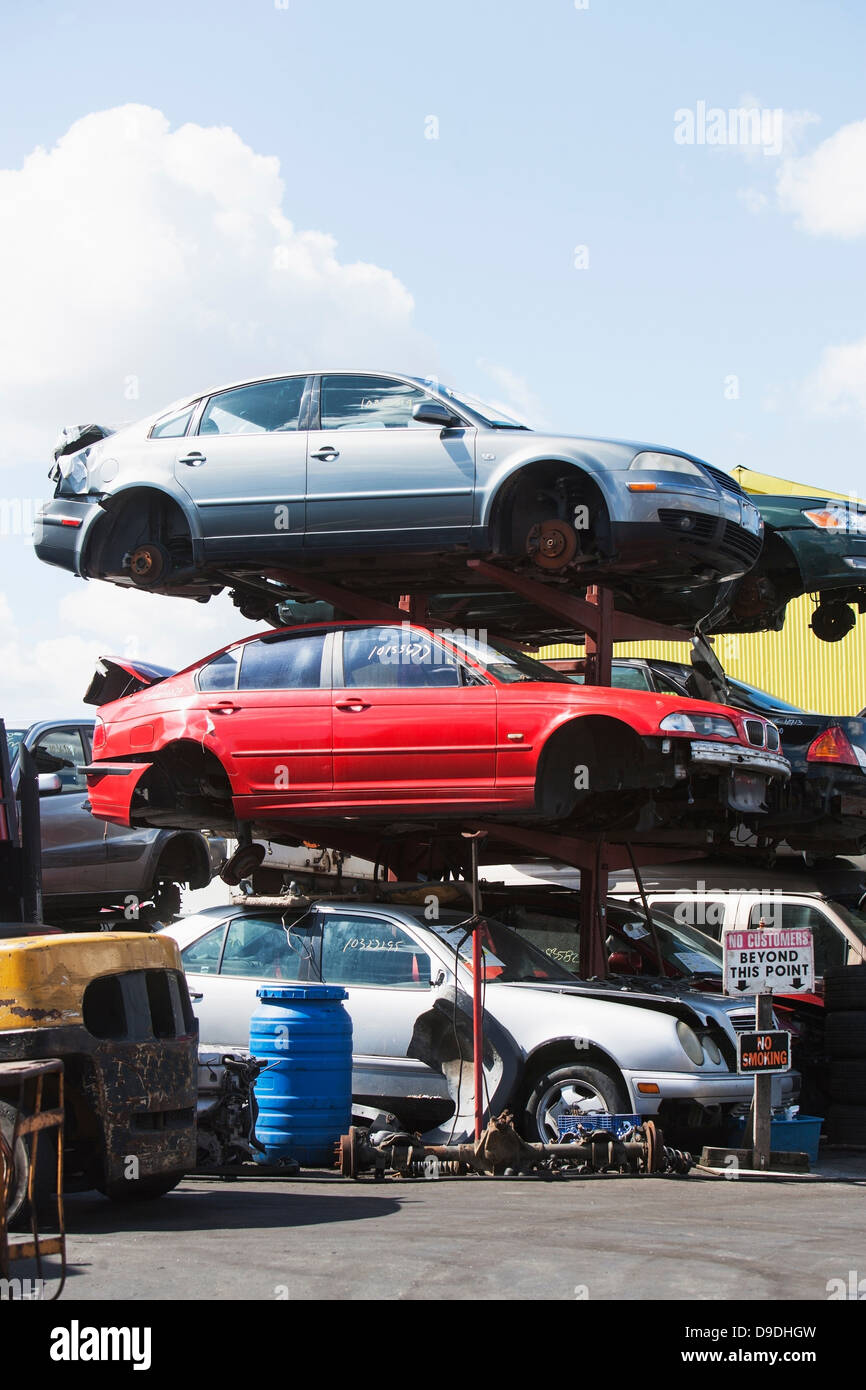 Cars stacked in scrap yard Stock Photo - Alamy