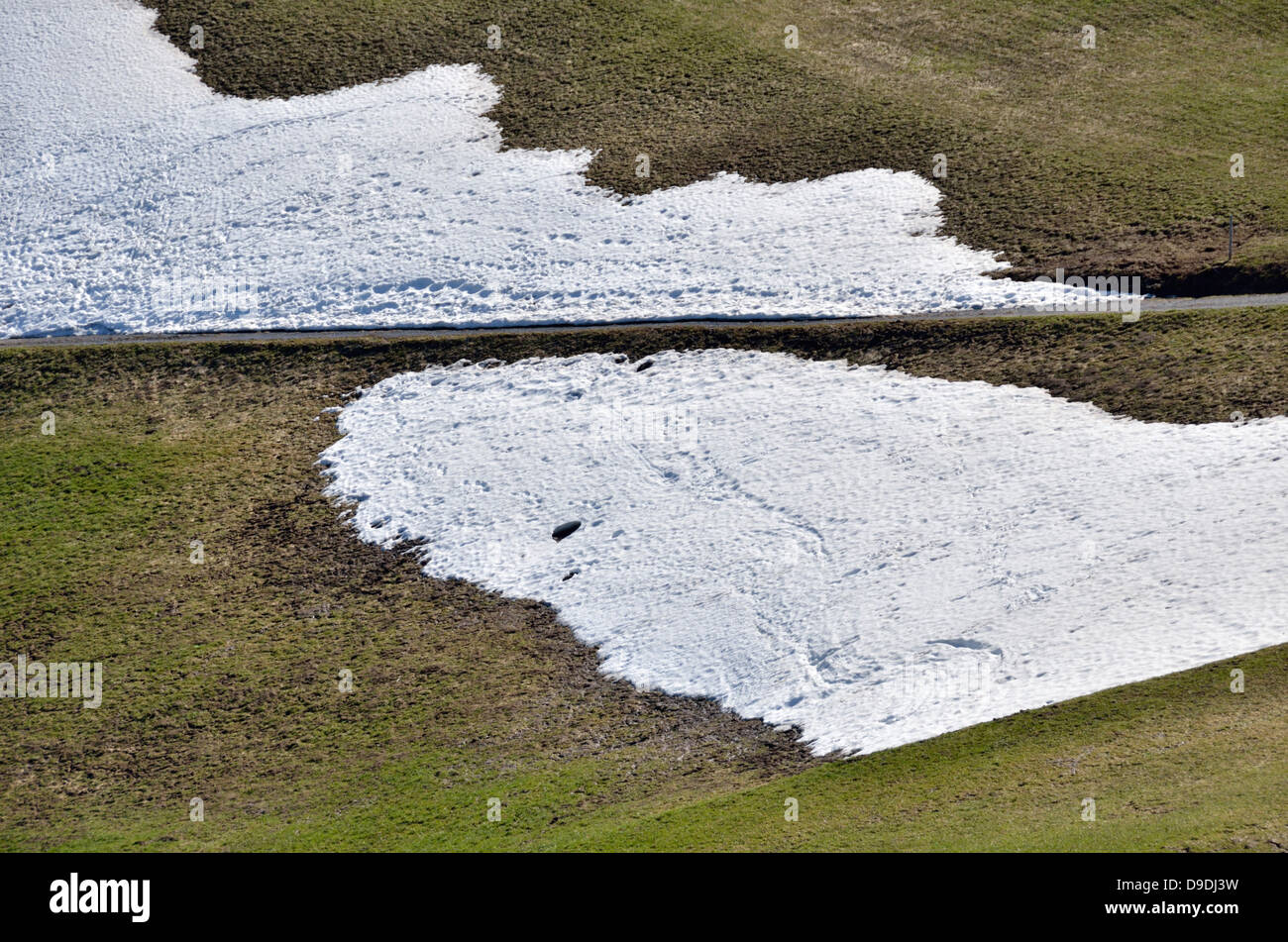 Snow patches on a Swiss hillside Stock Photo - Alamy