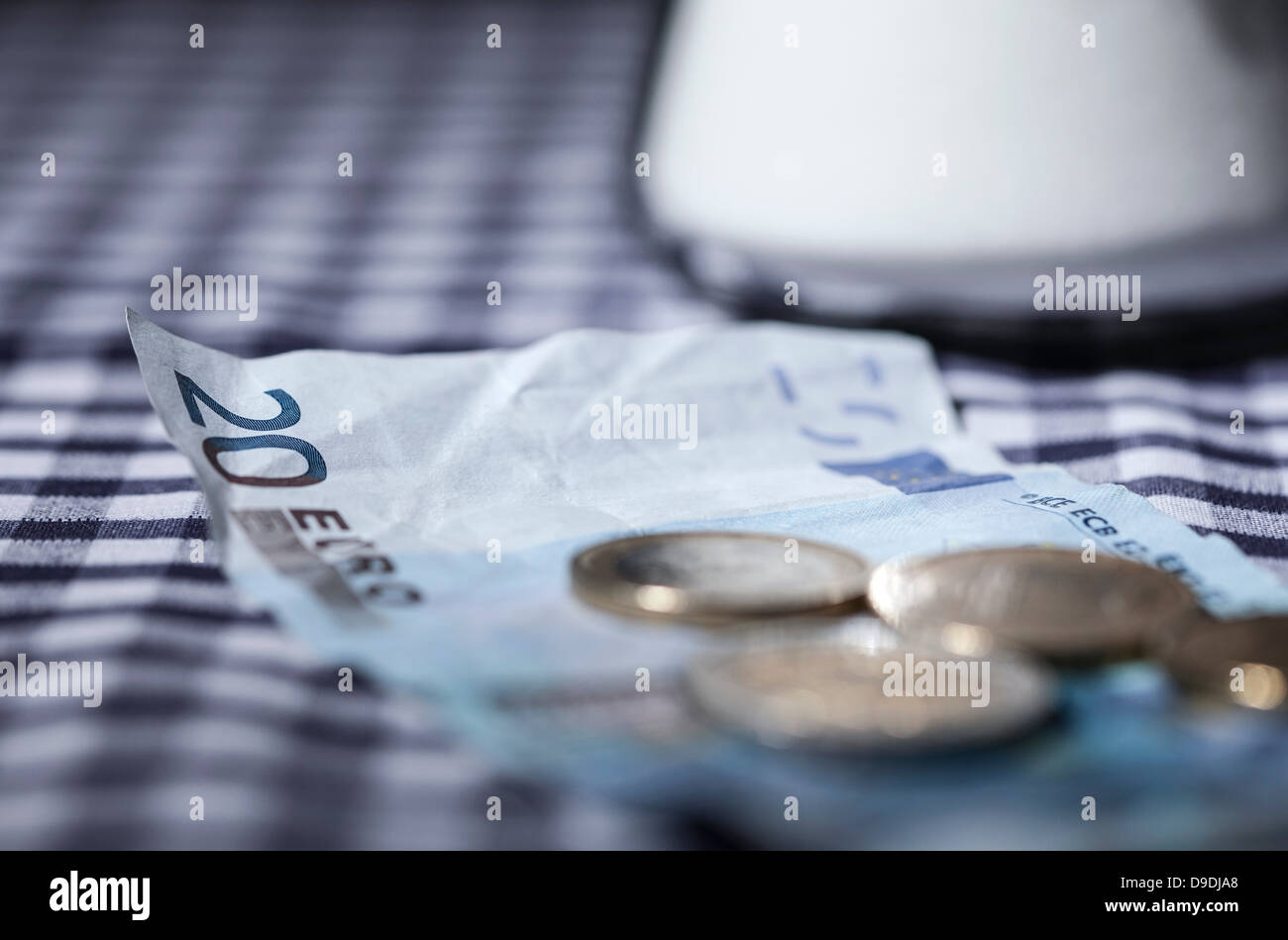 Money on table Stock Photo - Alamy