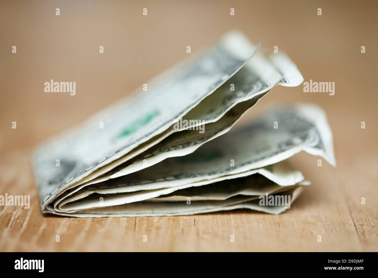 Money on table Stock Photo - Alamy