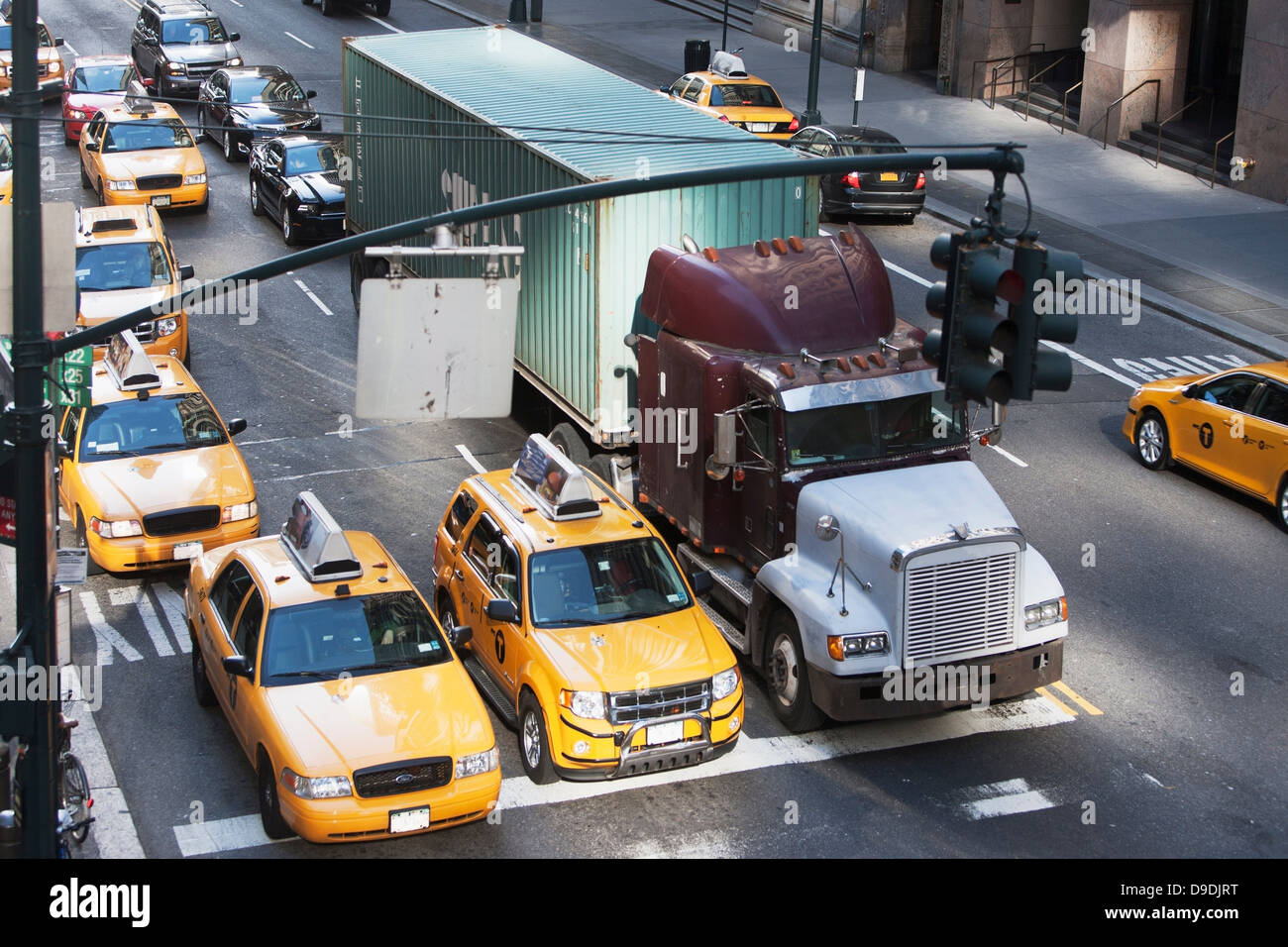 Yellow taxis waiting at traffic lights, New York City, USA Stock Photo ...