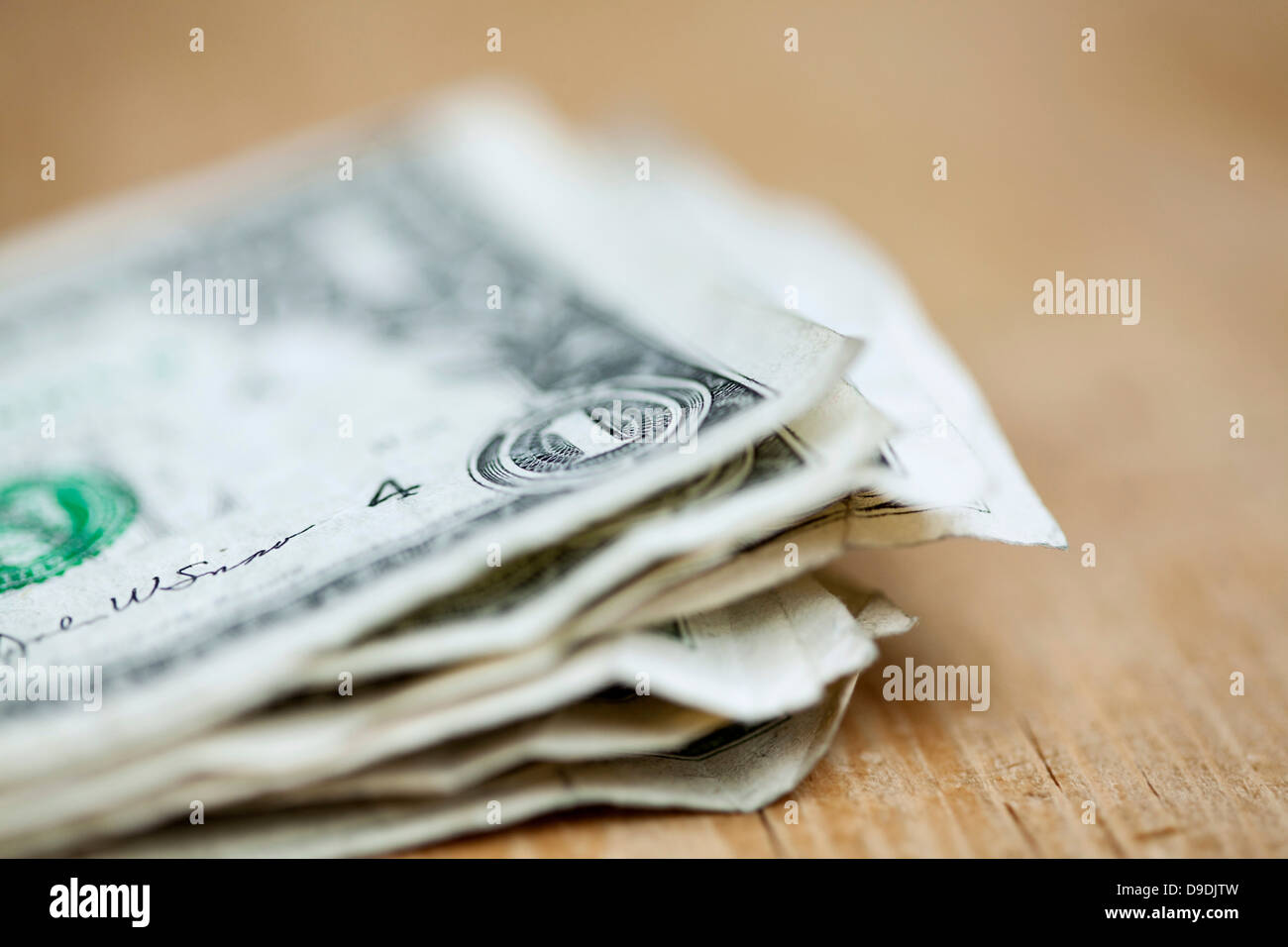 Money on table Stock Photo - Alamy