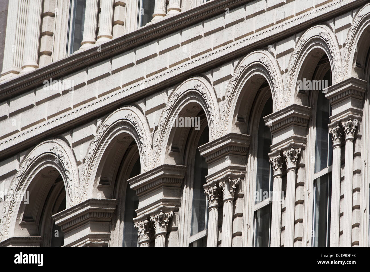 Detail of arched window in building Stock Photo - Alamy