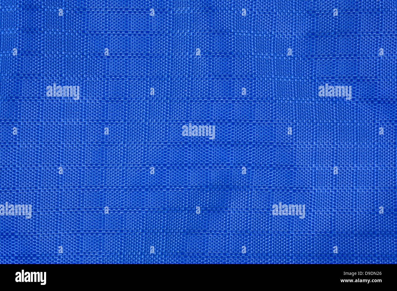 Close view of a wrinkled water resistant blue nylon fabric Stock Photo ...