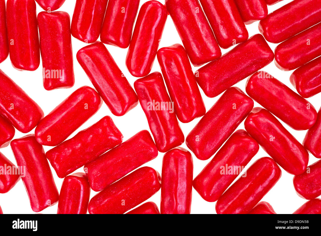 Several pieces of hot and spicy red chewing gum Stock Photo - Alamy