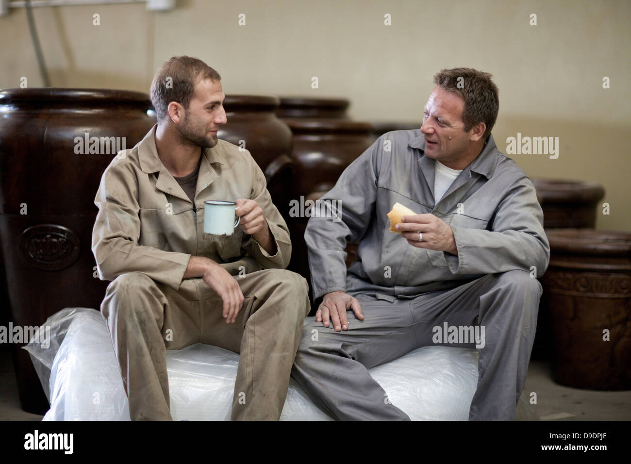 Factory worker taking a break Stock Photo - Alamy