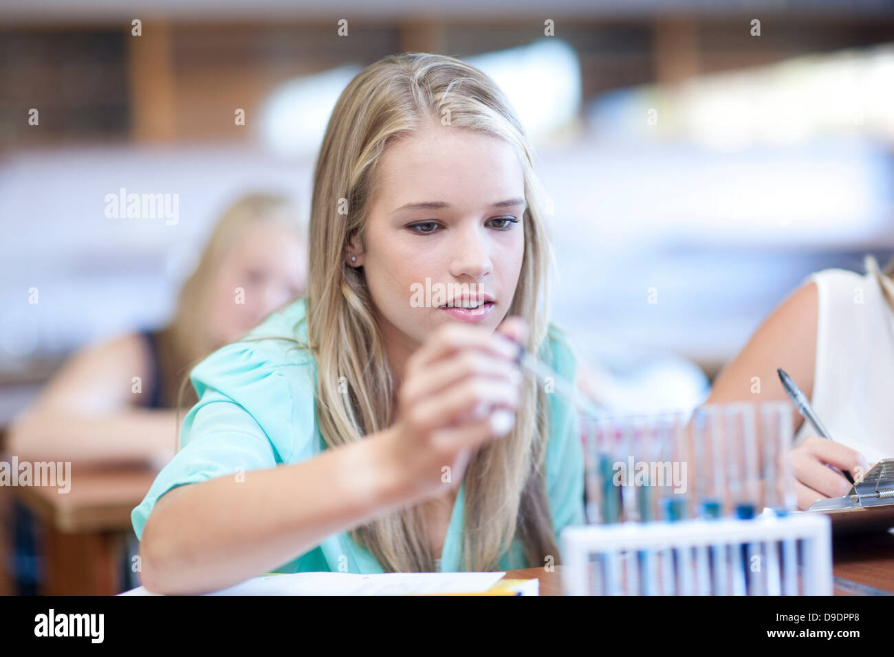 School girls enjoying science lesson hi-res stock photography and ...