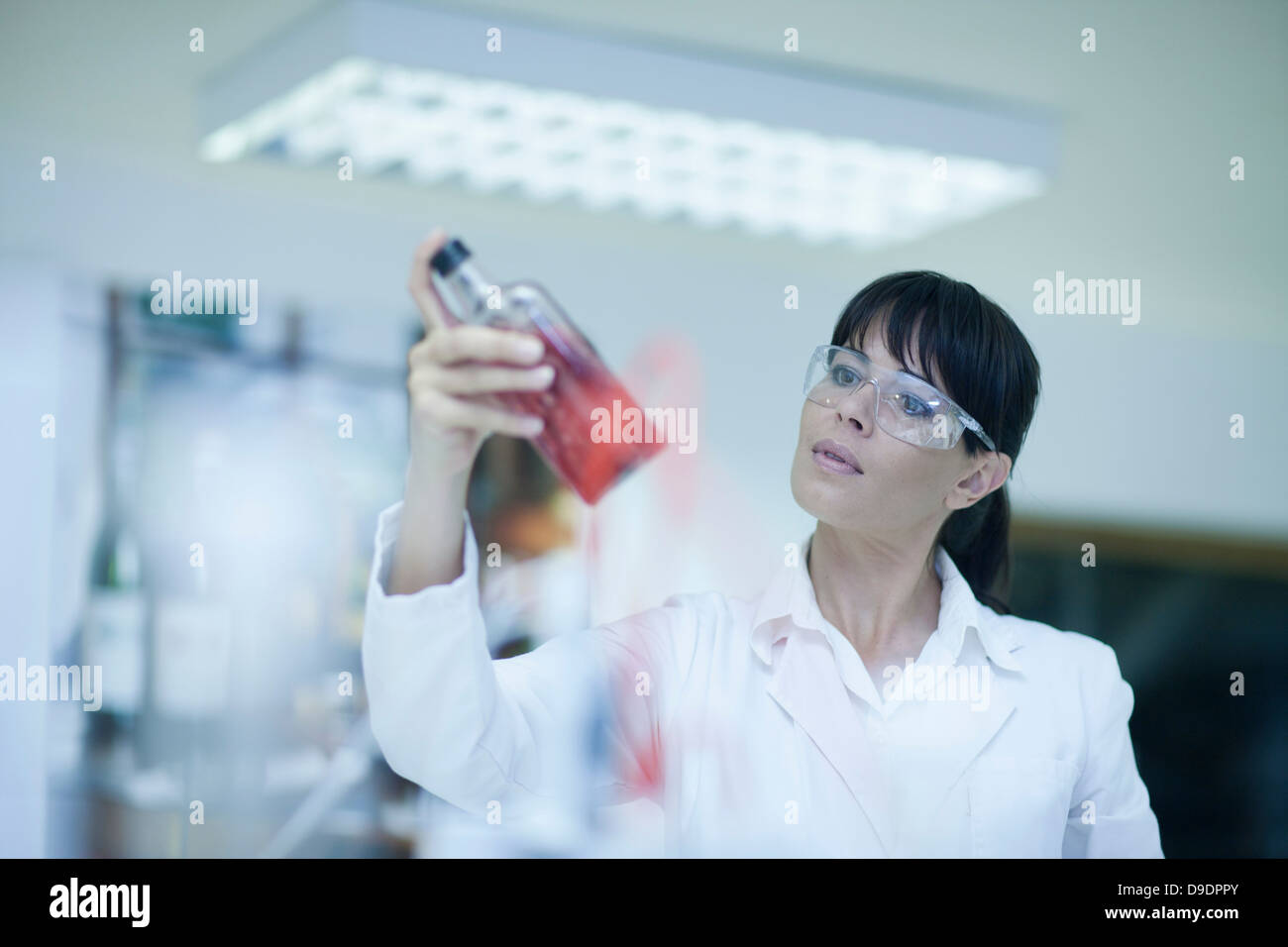 Oenologist monitoring sample testing in laboratory Stock Photo - Alamy