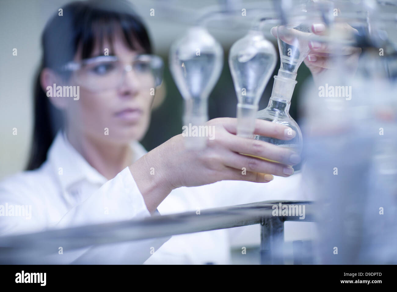Oenologist monitoring sample testing in laboratory Stock Photo - Alamy