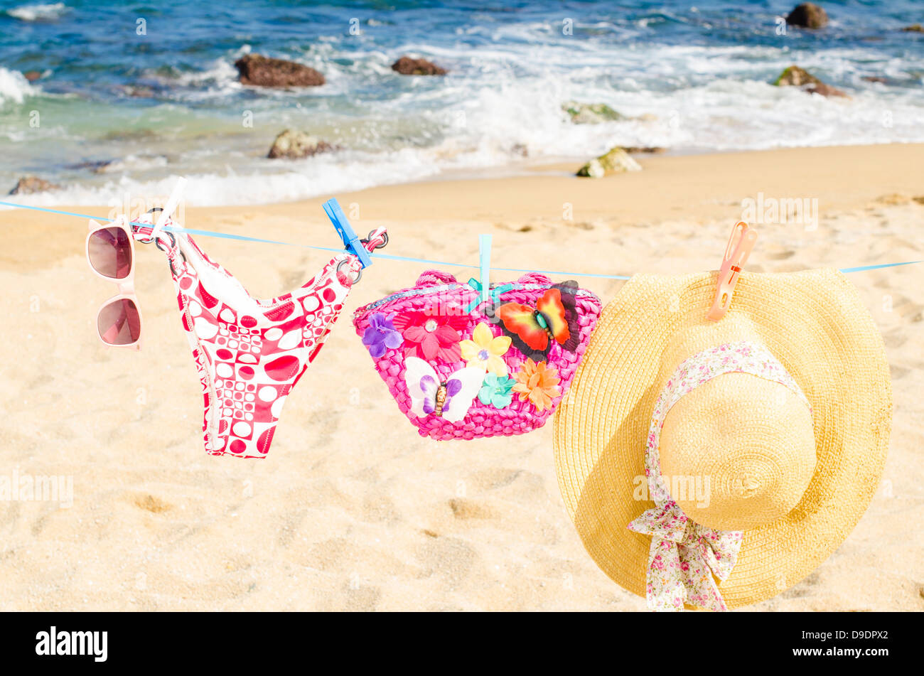 Clothes on shore beach hi-res stock photography and images - Alamy