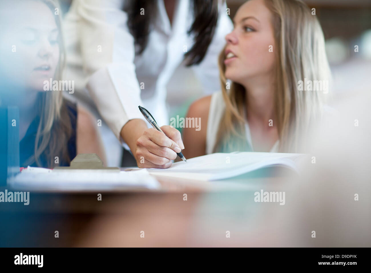 Science teacher in class Stock Photo - Alamy