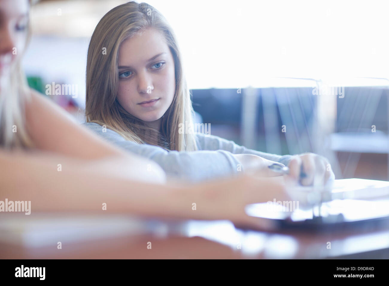 Waiting for chemical reaction in science lesson Stock Photo - Alamy