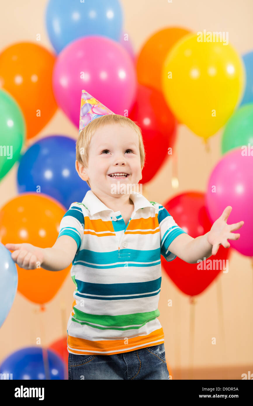 smiling child boy with balloons on birthday party Stock Photo - Alamy