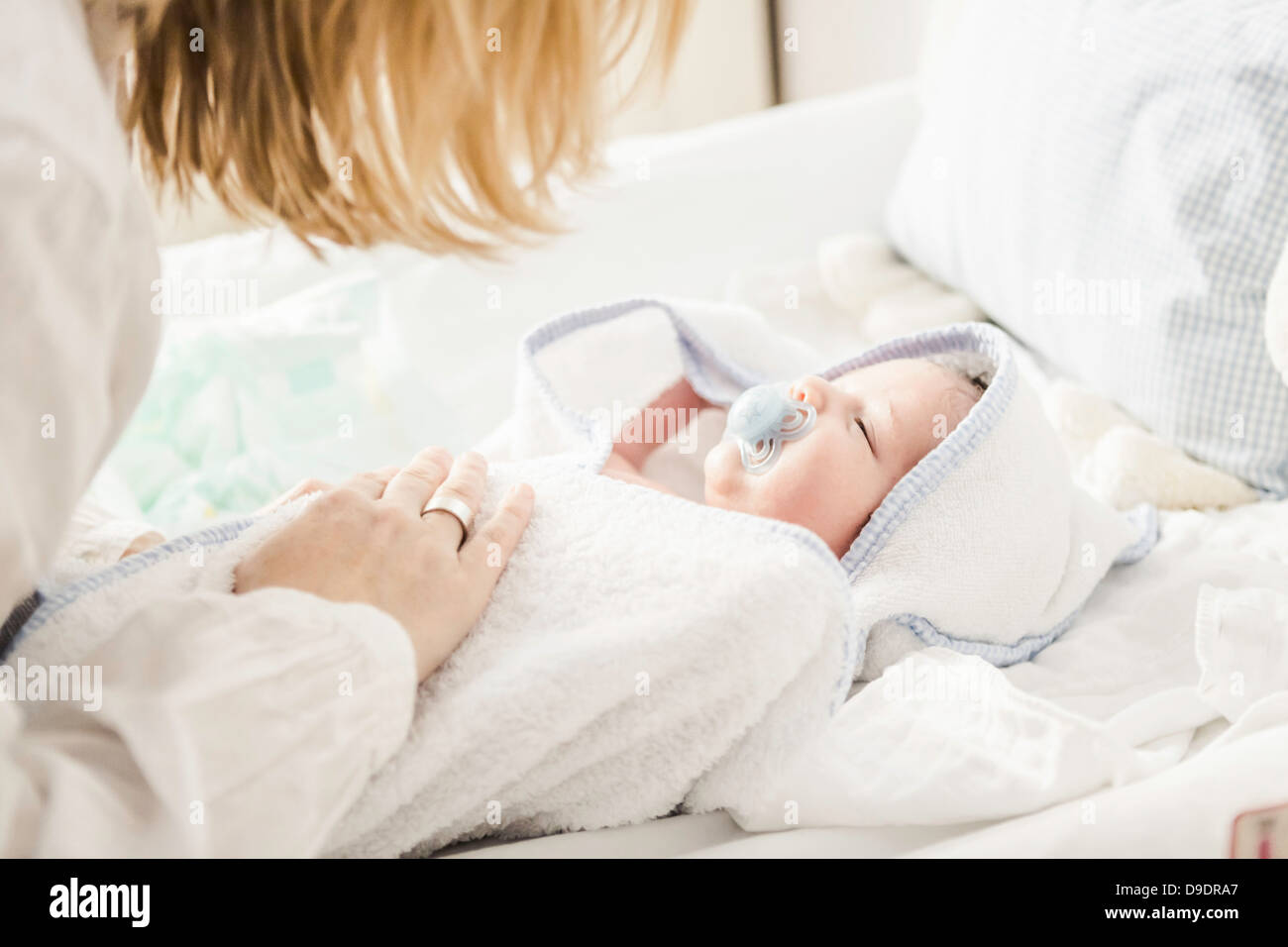 Baby sleeping cot mother hi-res stock photography and images - Alamy
