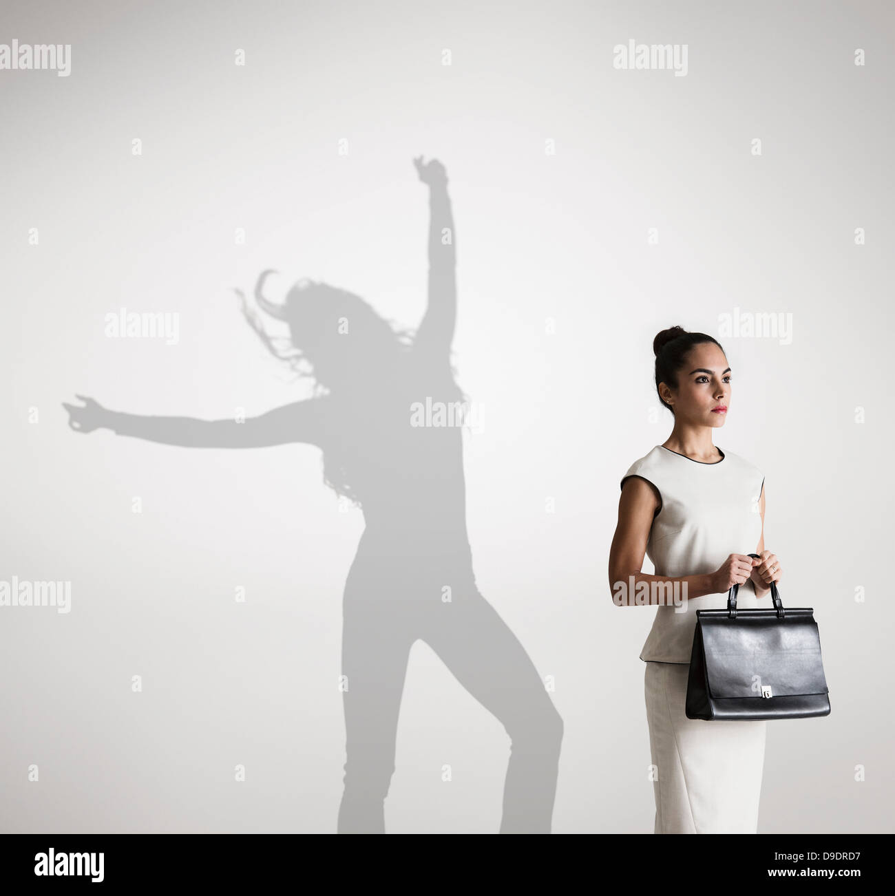 Woman with shadow in background dancing hi-res stock photography and ...