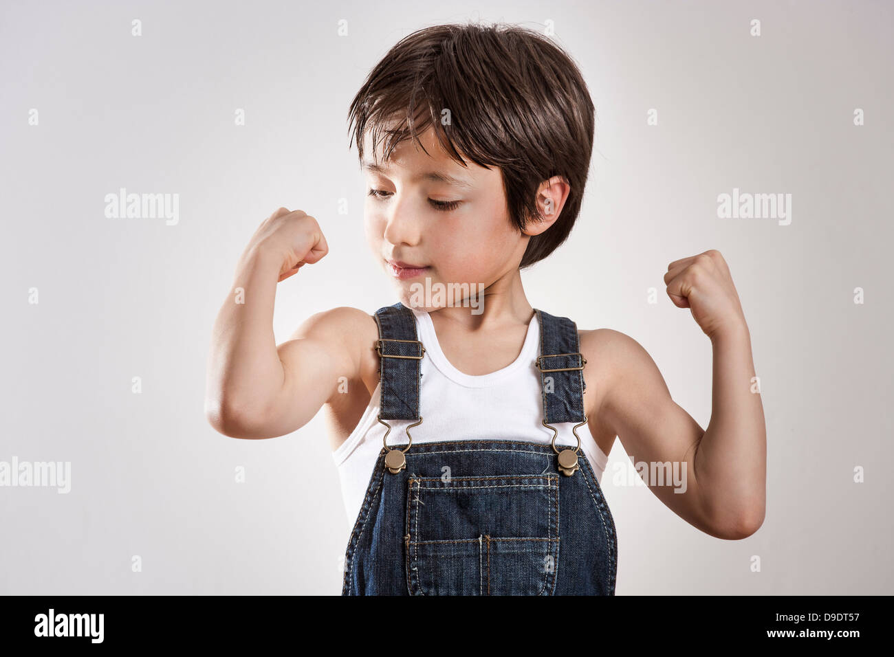 Boy flexing hi-res stock photography and images - Alamy