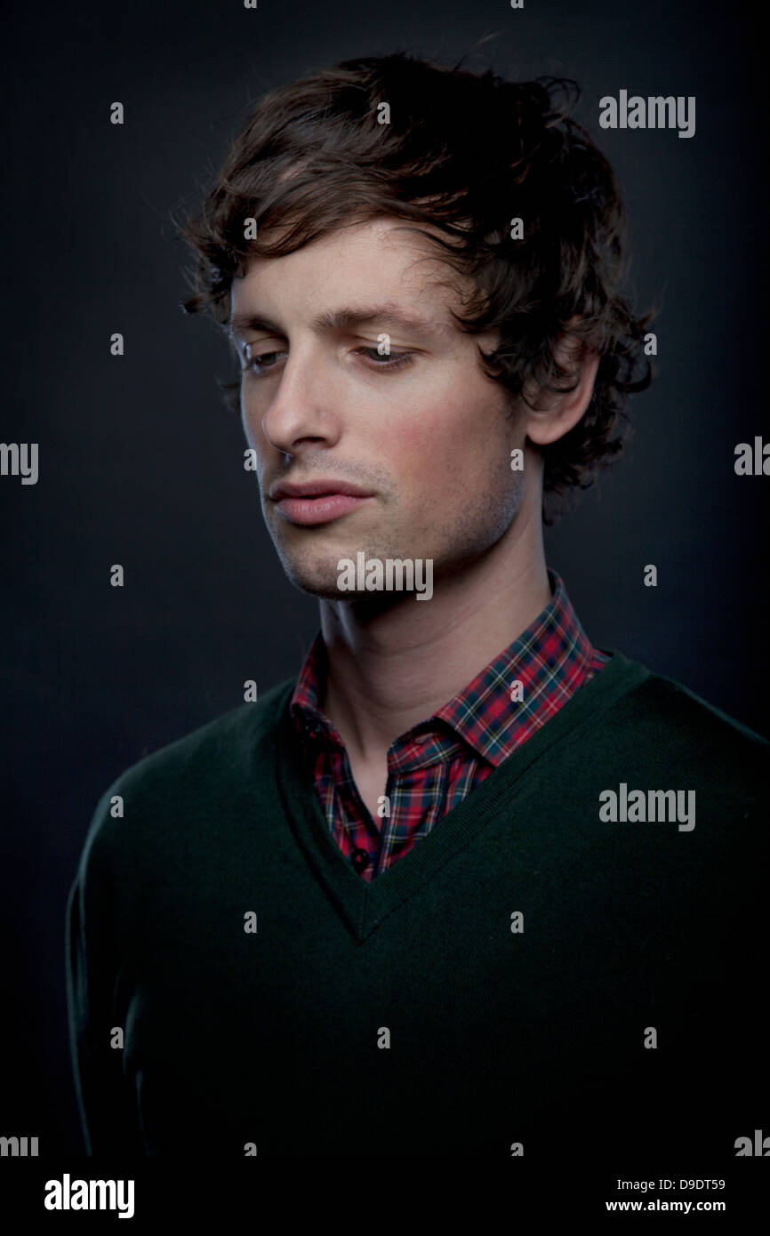 Portrait of contemplative young man Stock Photo - Alamy Portrait of contemplative young man Stock Photo - Alamy