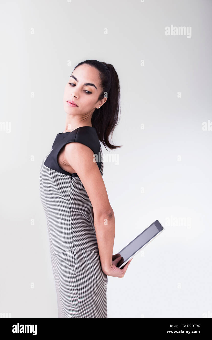 Smart woman hiding behind hi-res stock photography and images - Alamy