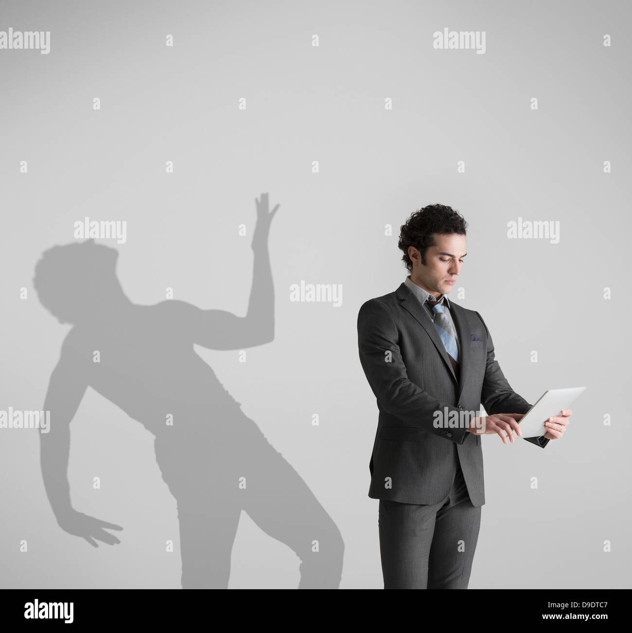 Man with shadow in background dancing Stock Photo - Alamy