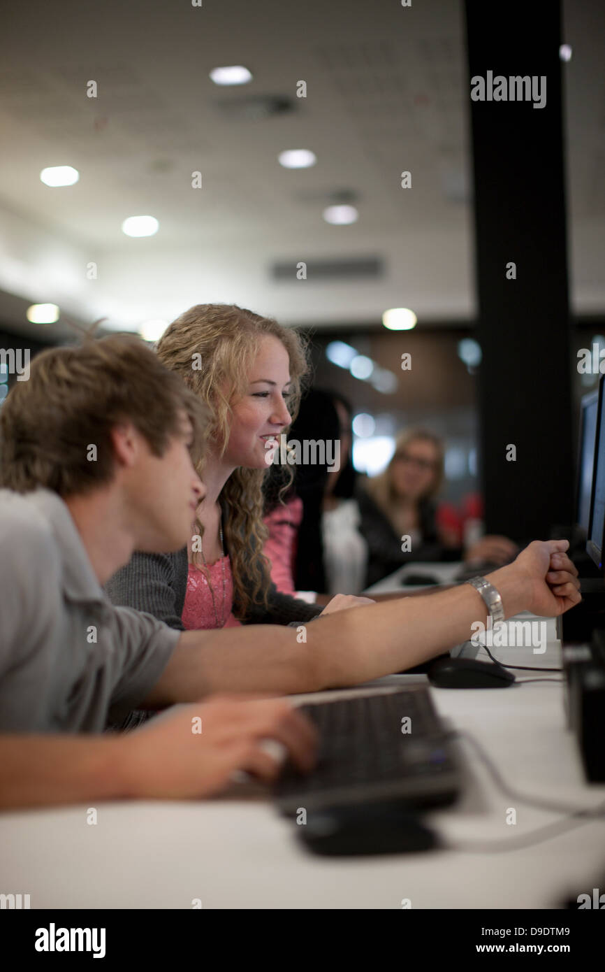Students using computers in class Stock Photo - Alamy