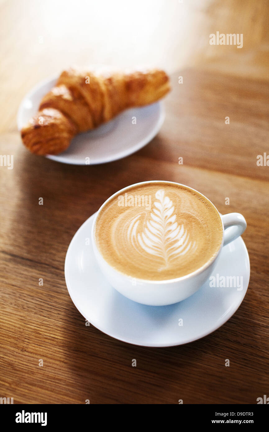 Latte and croissant Stock Photo - Alamy