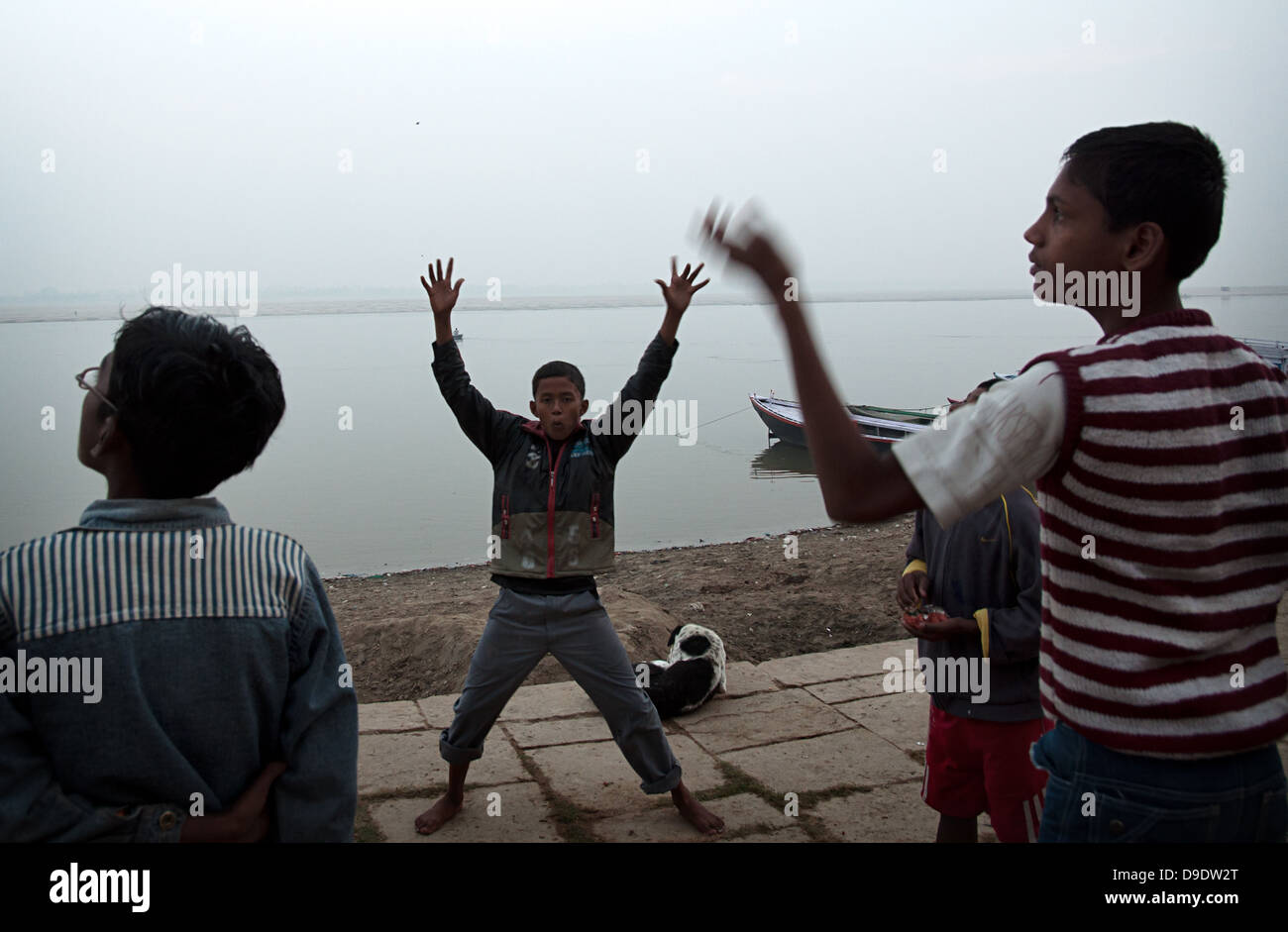 Children playing at the Ganges riverbank. Varanasi, Benares, Uttar ...