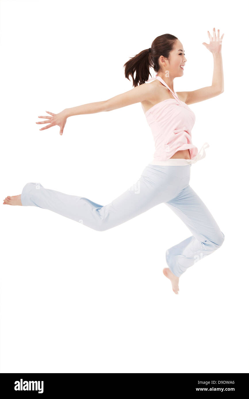 young woman dancing and jumping Stock Photo - Alamy